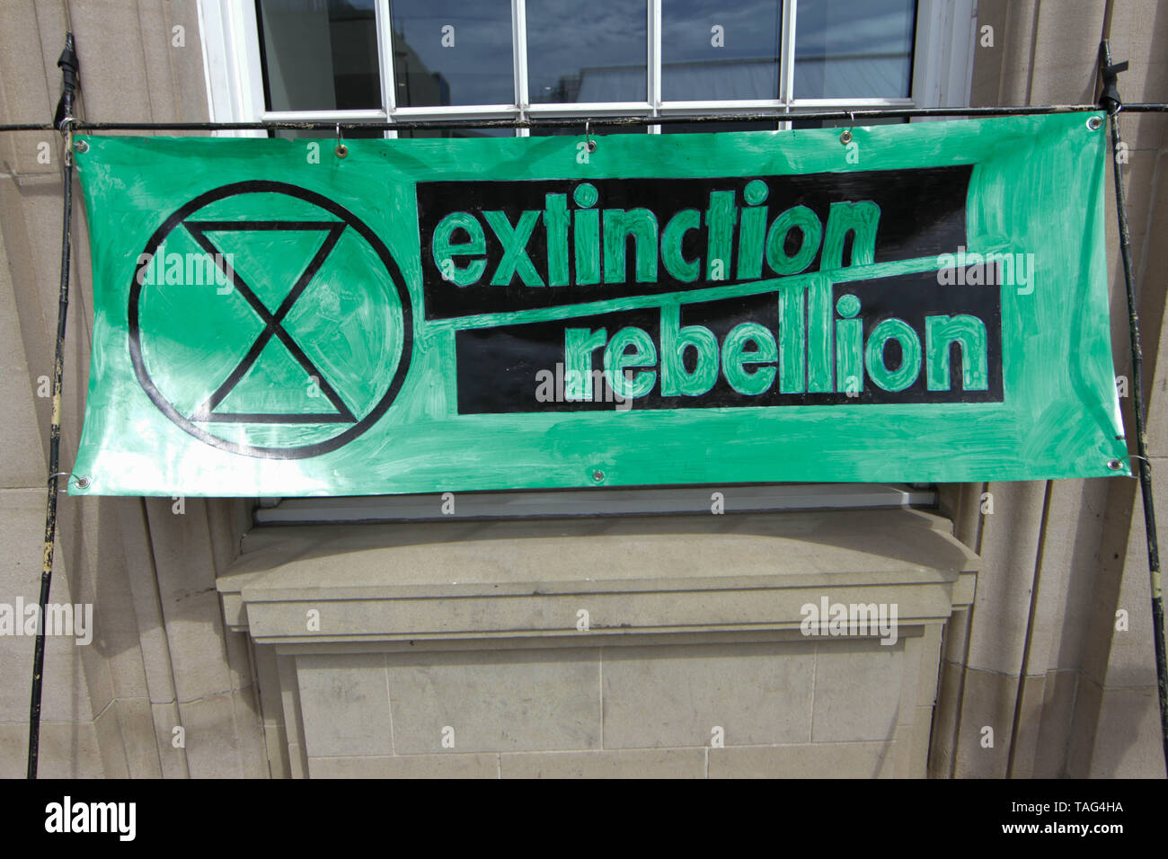 An Extinction Rebellion banner during a demo outside Derby City Council ...