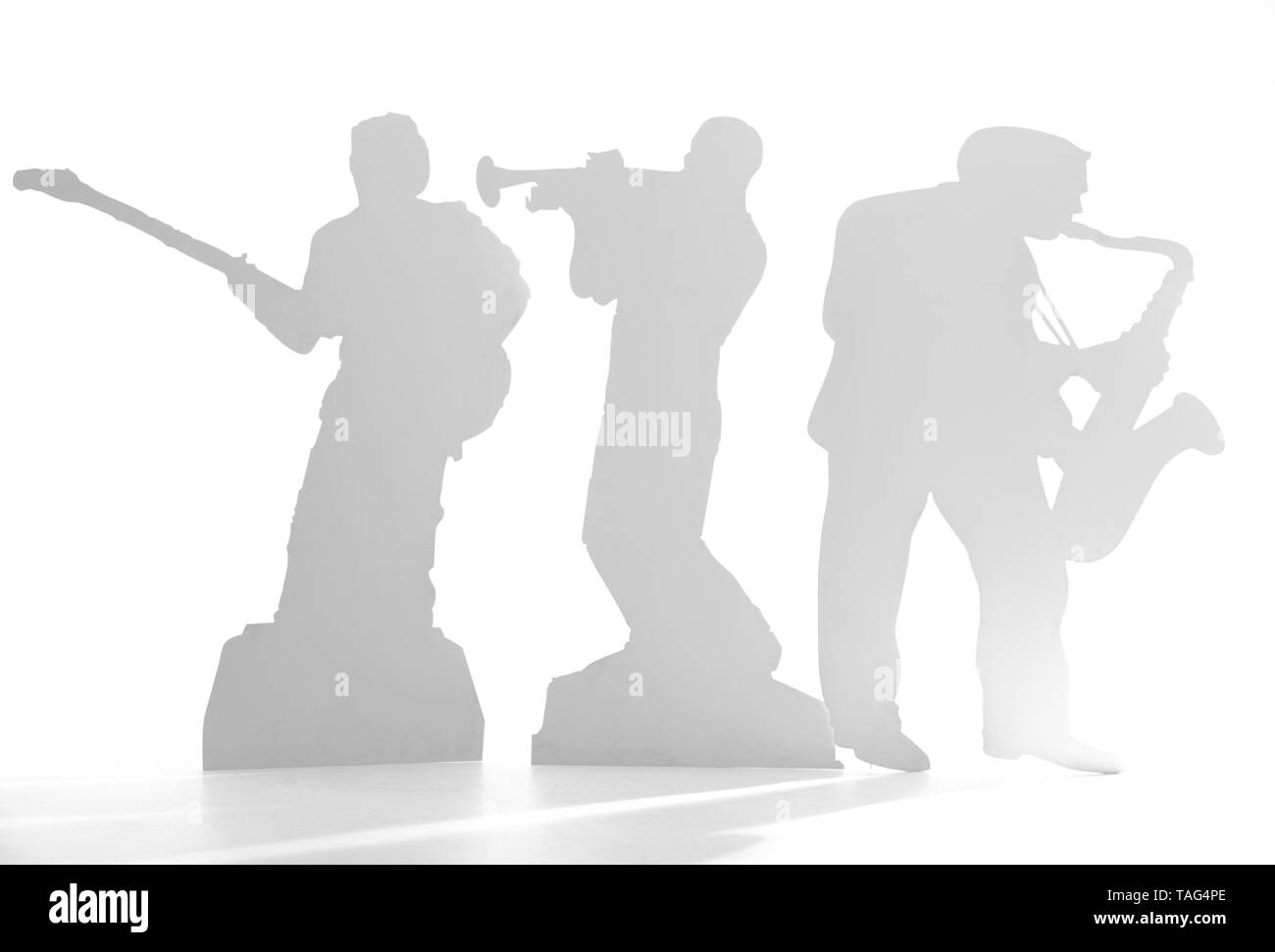 Isolated shadow of a musician on white background in studio Stock Photo ...