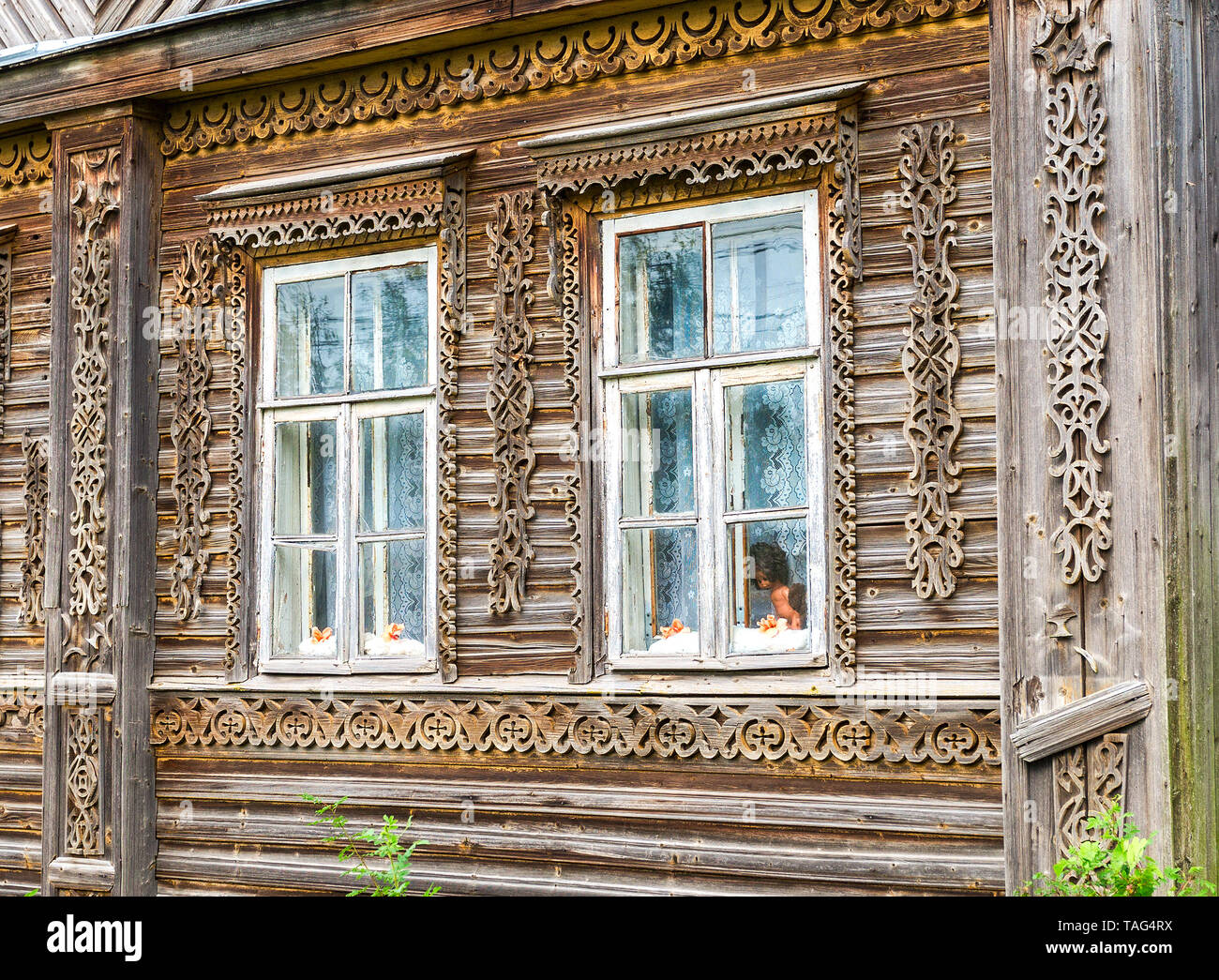 Russian traditional wooden architecture. Facade of an old house ...