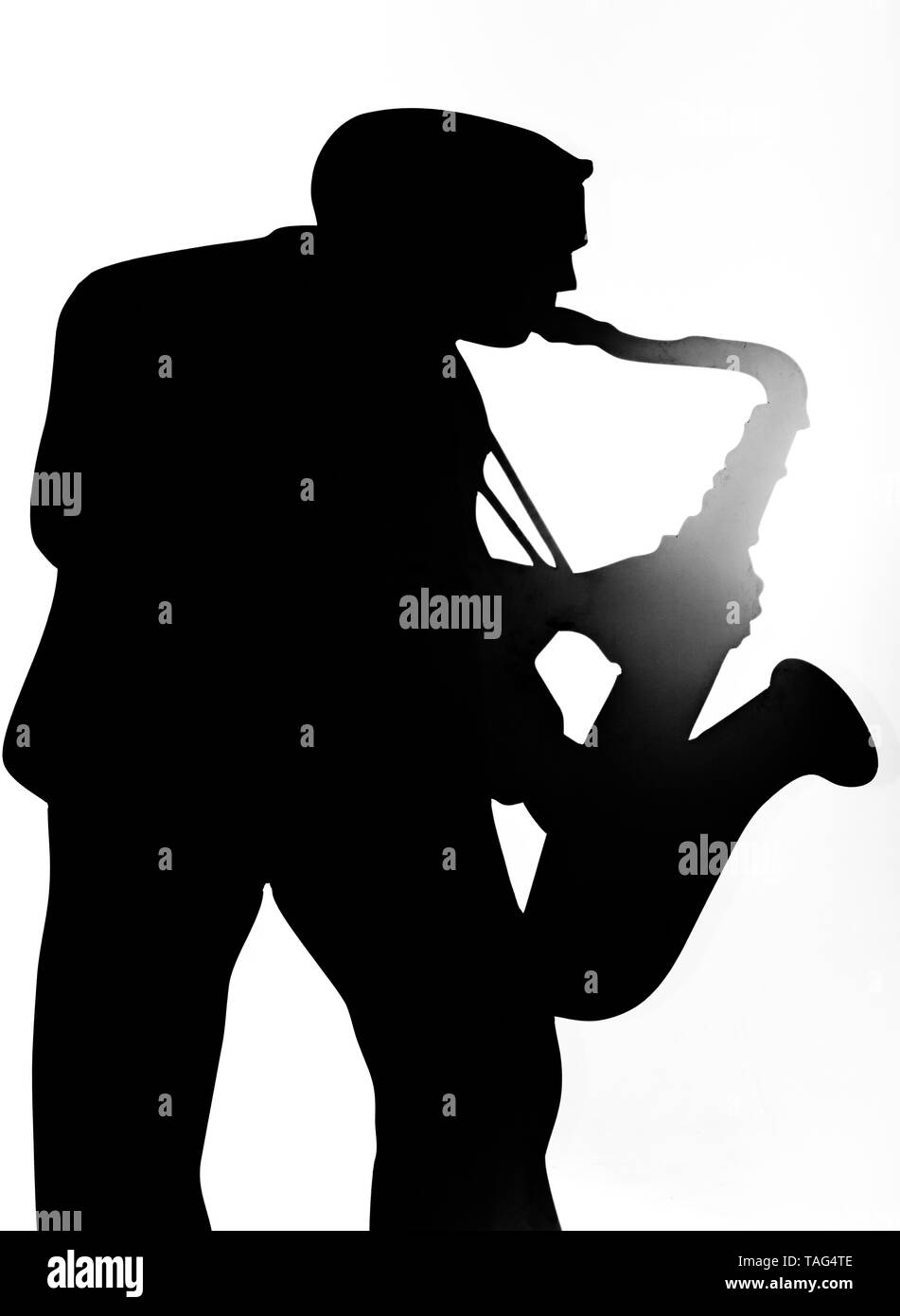 Silhouette of man playing a saxophone hi-res stock photography and ...