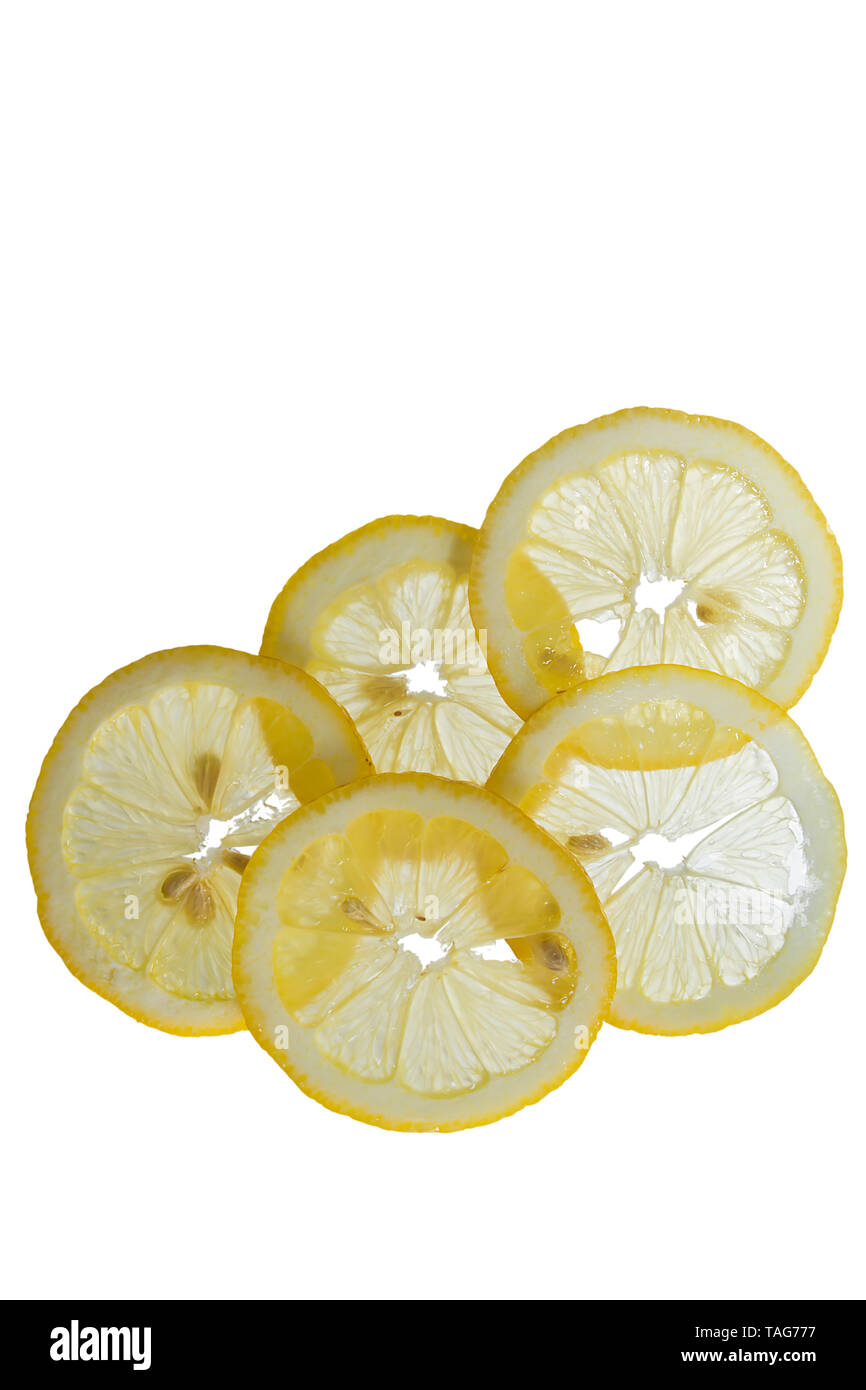 Round lemon slices on white isolated background Stock Photo - Alamy