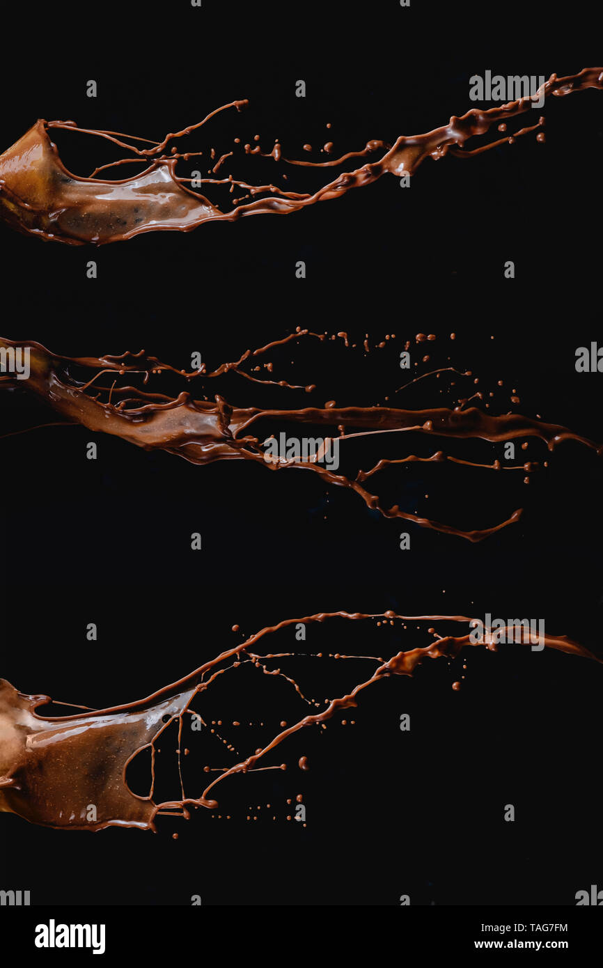 Hot chocolate splash collection, cocoa splash texture on a black ...