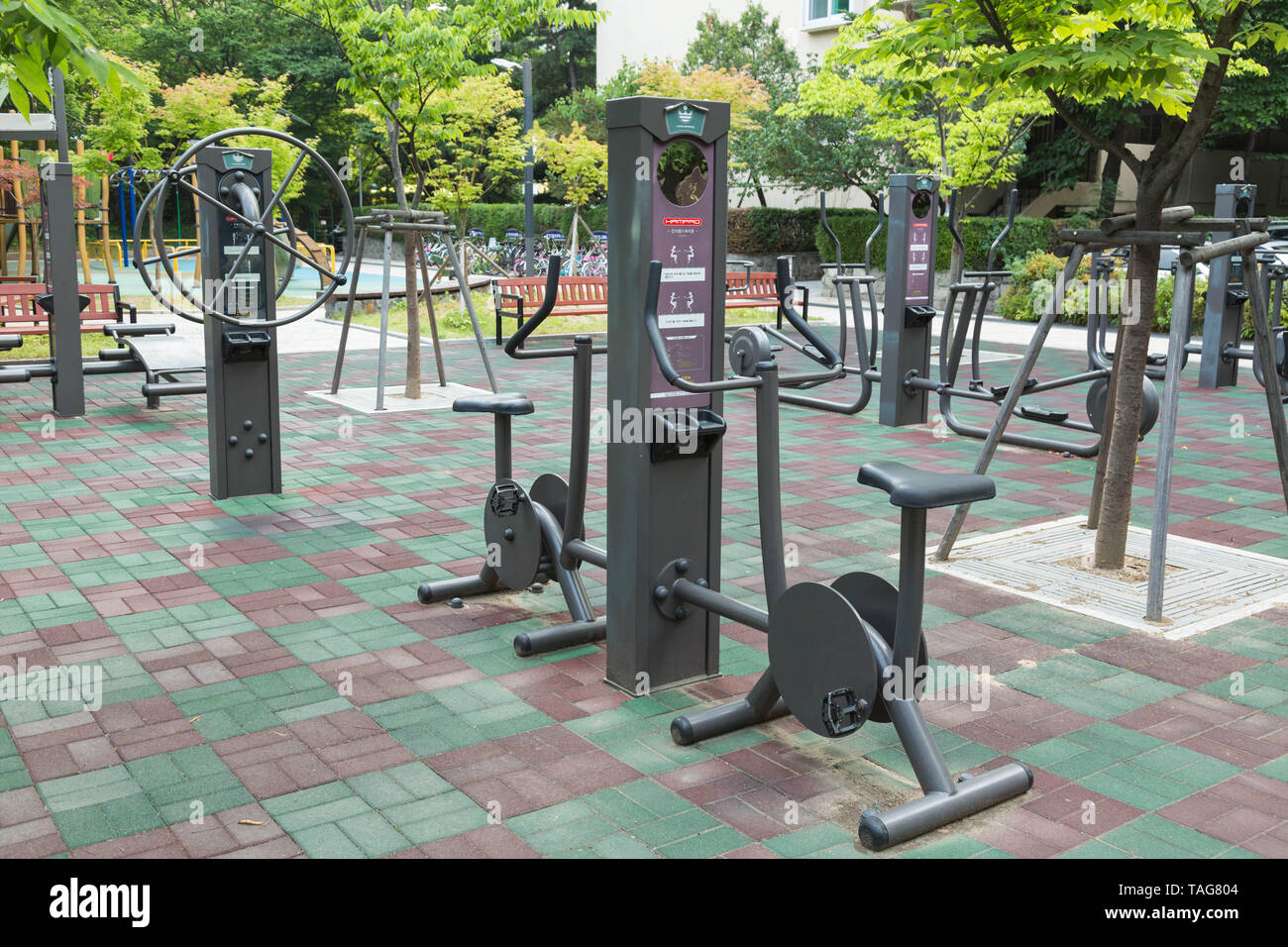 Various exercise equipment for public to use at most of parks in cities ...