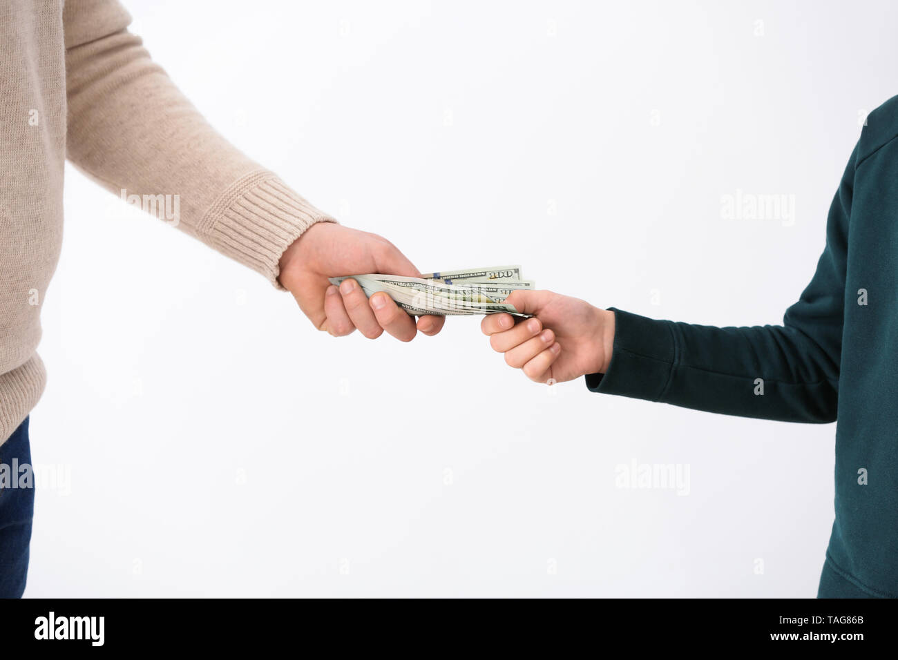 Parent giving money to adult child hi-res stock photography and images ...