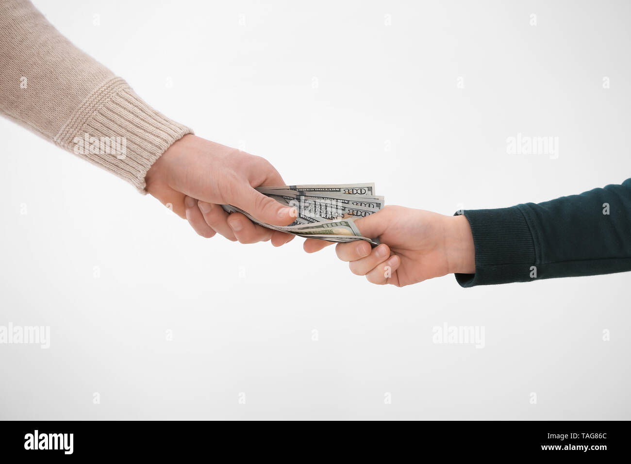 Father giving money son hi-res stock photography and images - Alamy