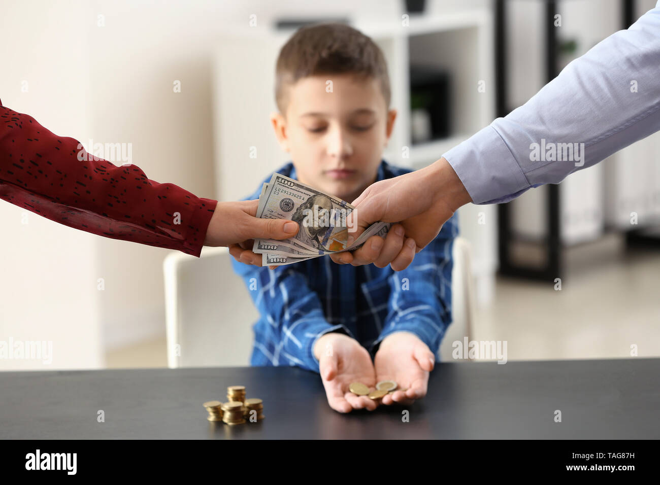 Man giving alimony to his ex-family in lawyer's office Stock Photo - Alamy