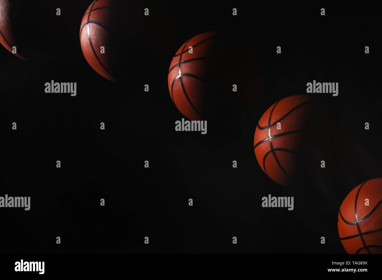 Stroboscopic photo of moving ball on dark background Stock Photo - Alamy