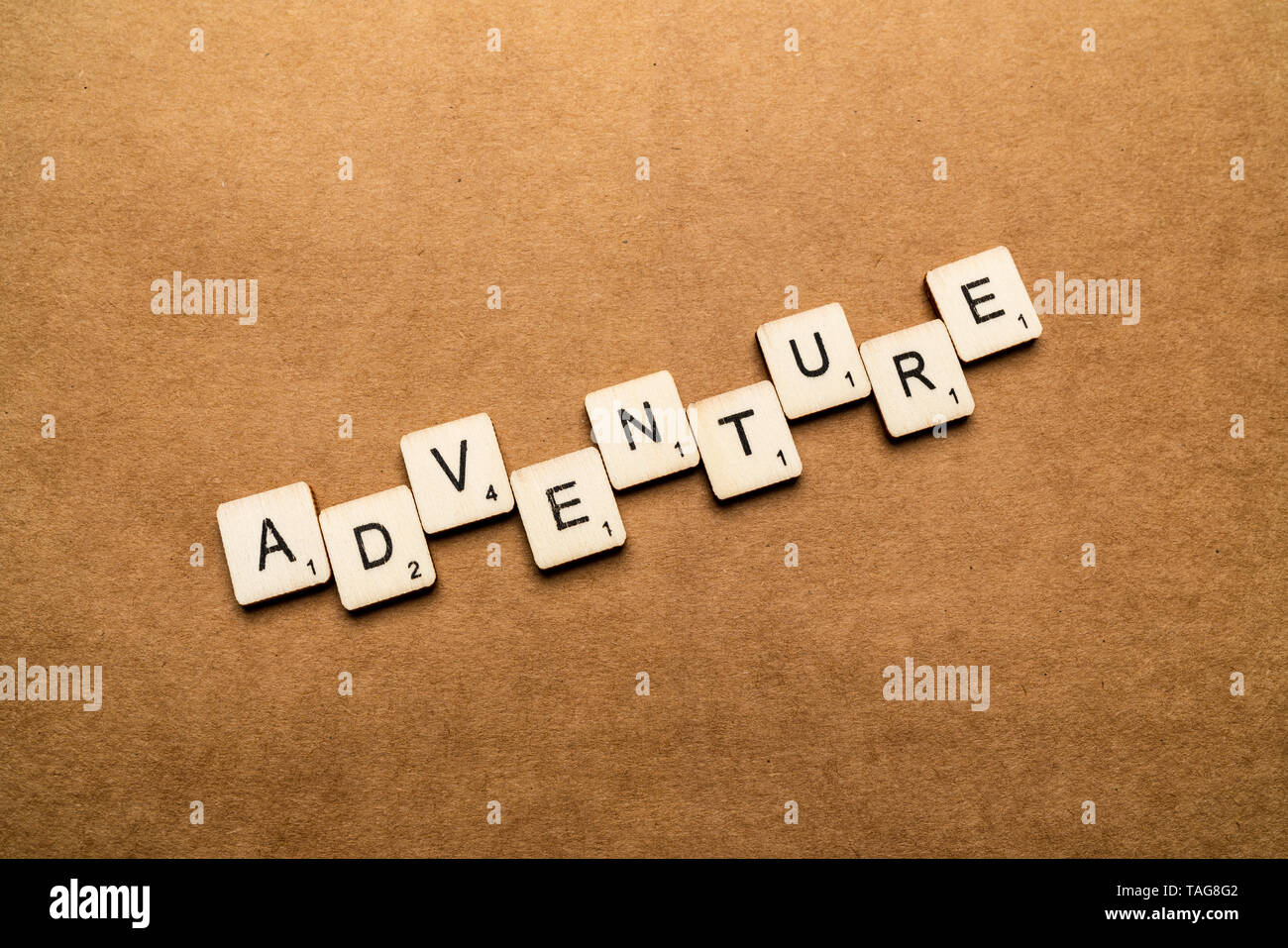 LONDON, UK - May 24 2019: The word ADVENTURE, spelt with wooden letter ...