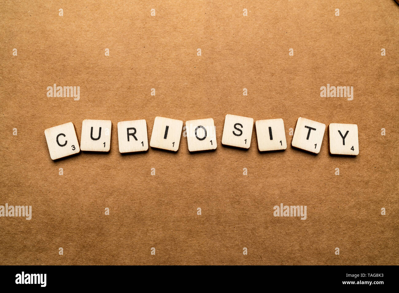 LONDON, UK - May 24 2019: The word CURIOSITY, spelt with wooden letter ...