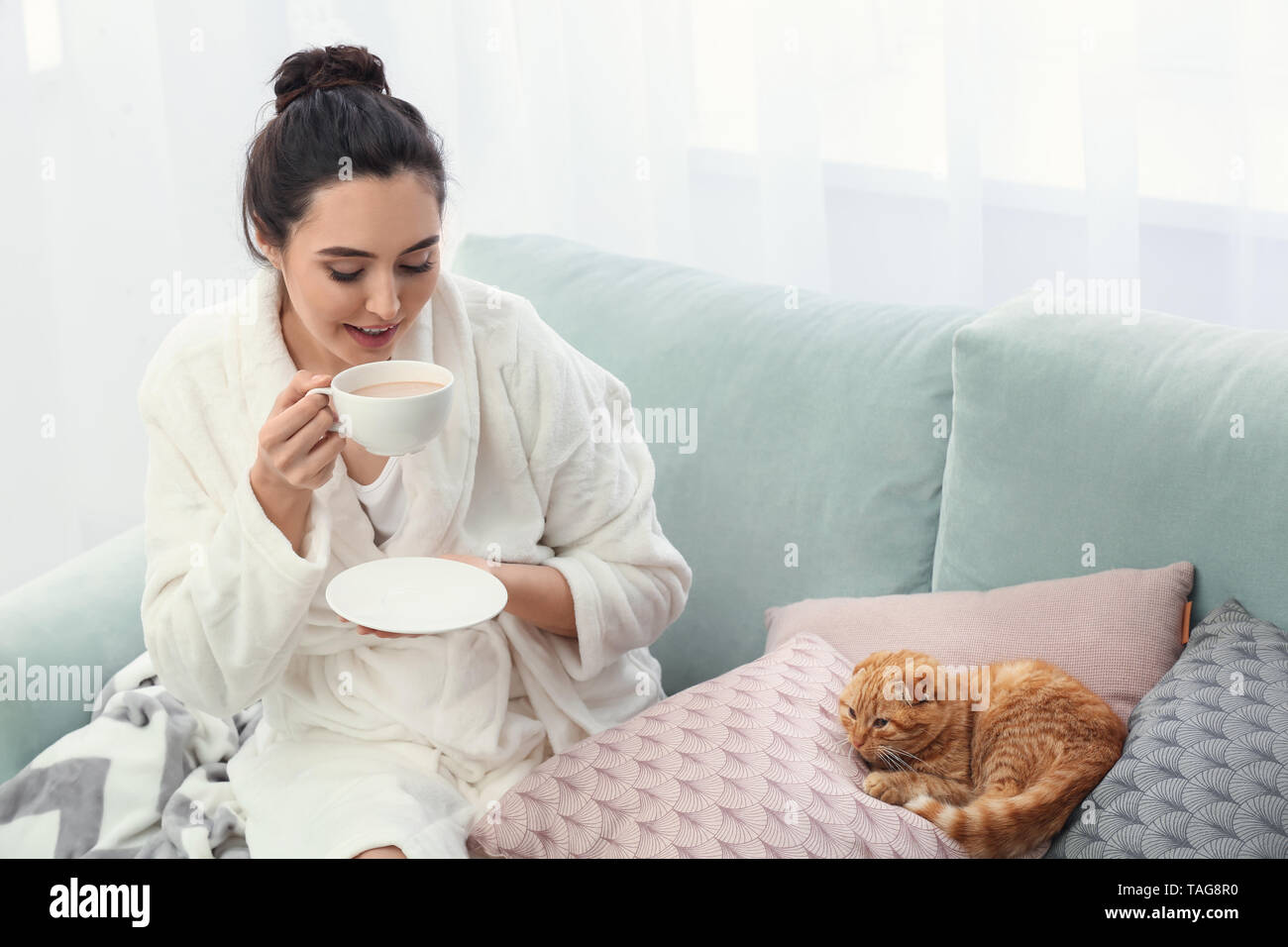 Cat drinking coffee hi-res stock photography and images - Alamy