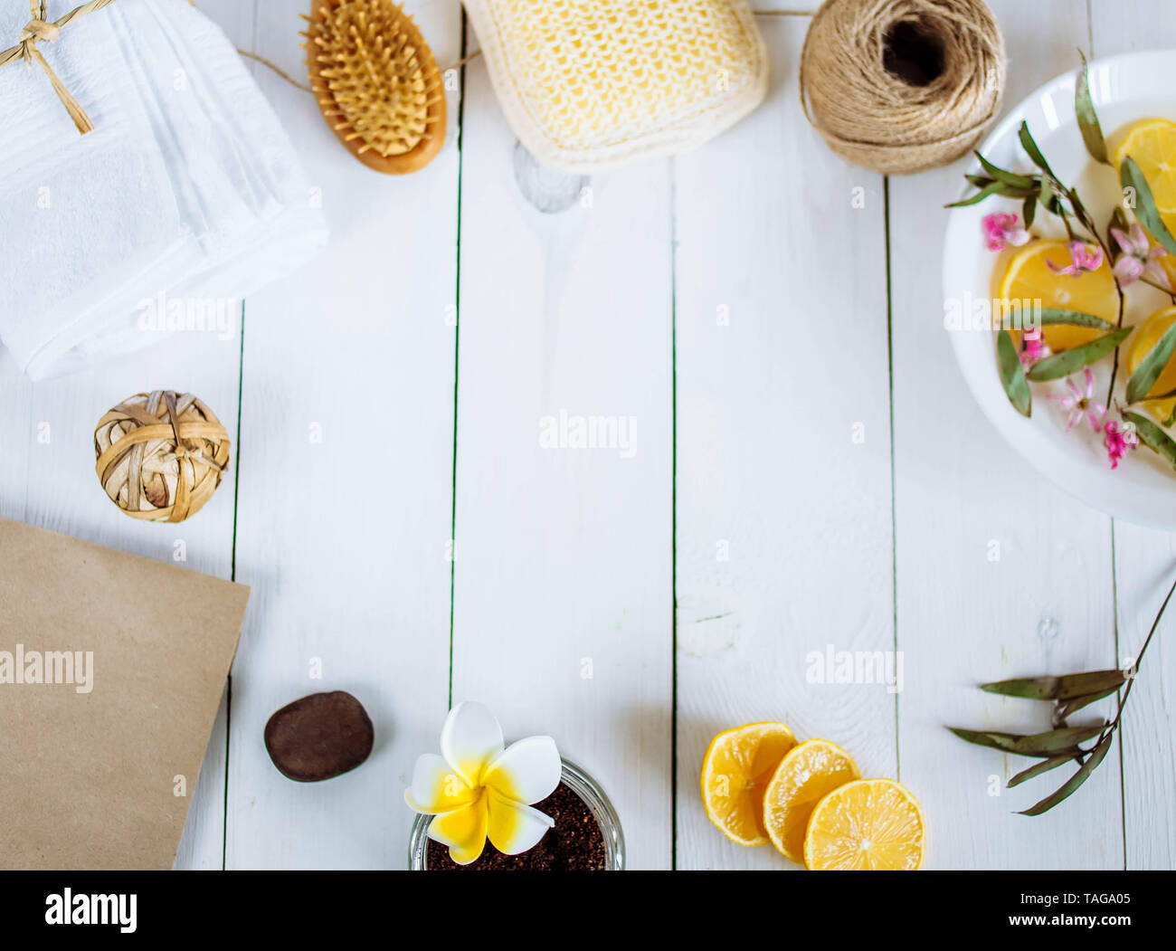 Homemade lemon essential oil, salt bath and fresh honey in the plate ...