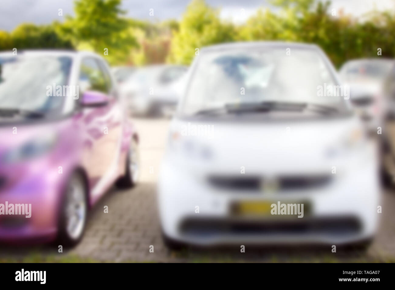 strong blurred, new modern cars on road. Compact city car Stock Photo ...