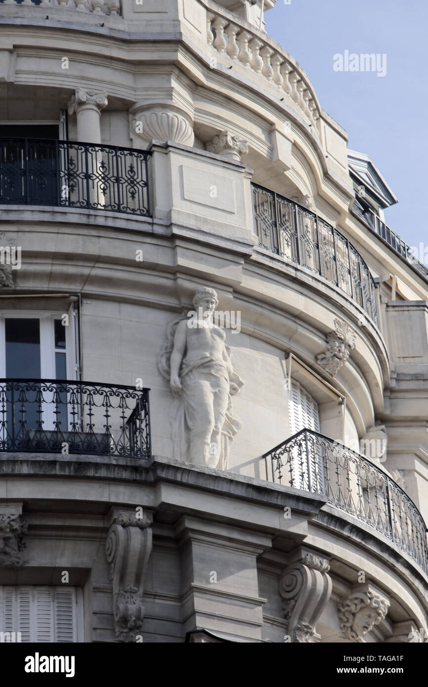 The old corner building with a circular Foundation, balcony with a ...