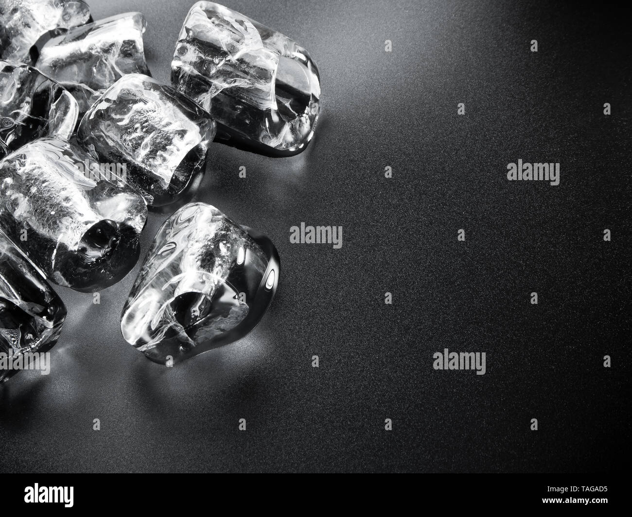 light reflex in ice tube on black background Stock Photo - Alamy