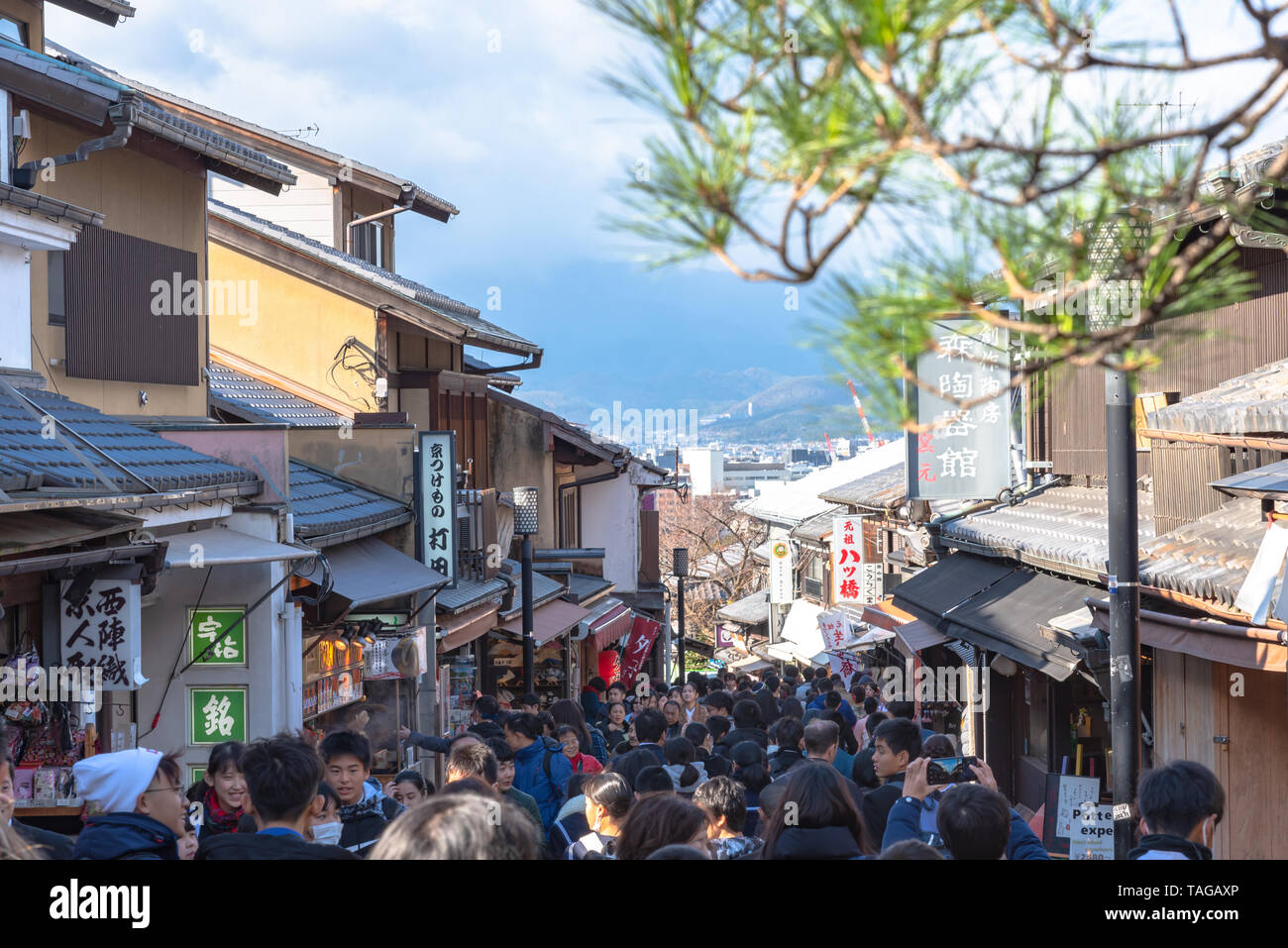 Crowded tourist on shopping street Matsubara-dori. Full of shops and ...