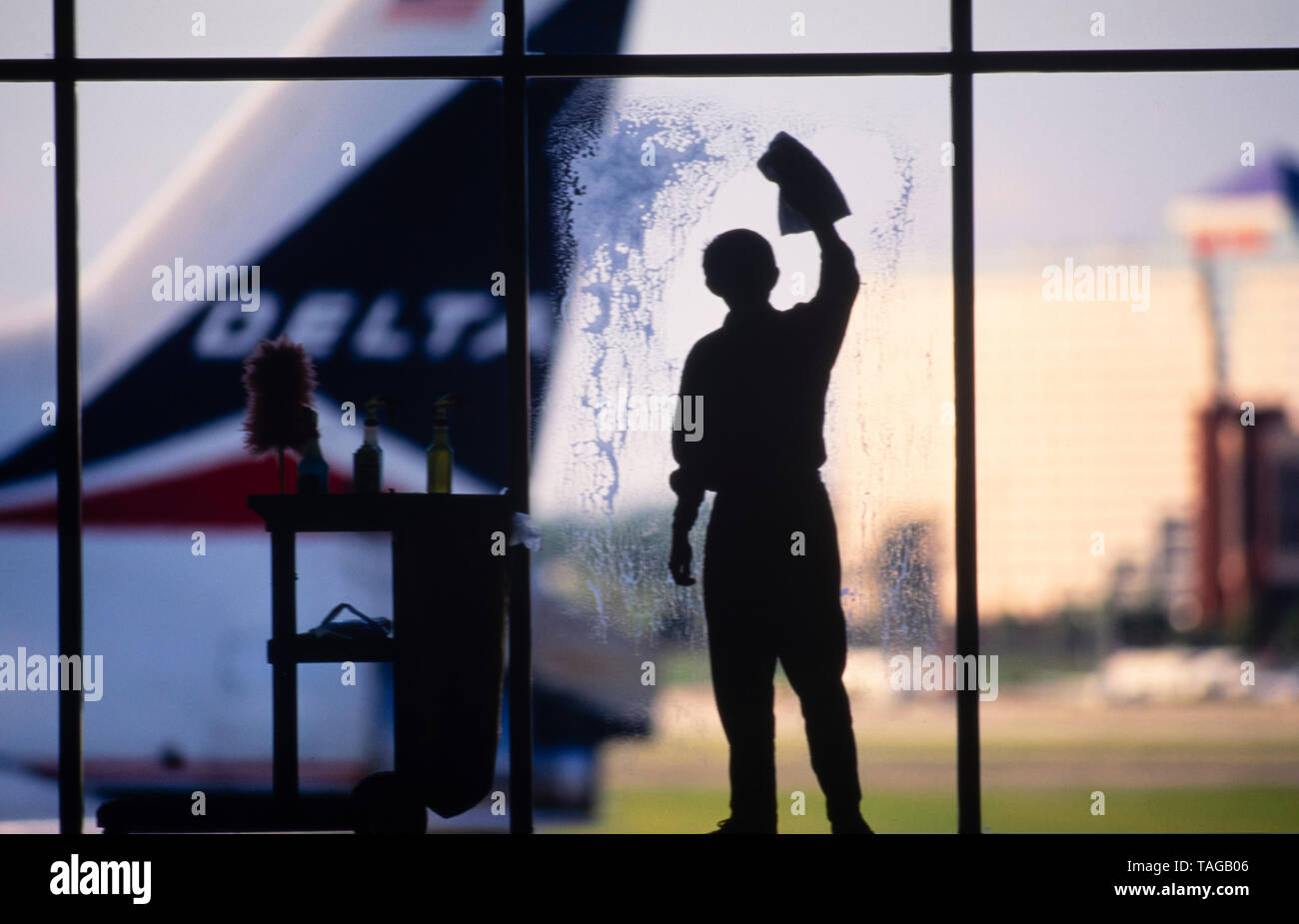 A maintainance worker cleans windows at the Hartsfield Jackson ...