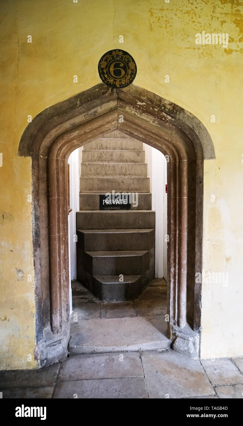Very old arched stone doorway with vanishing stairs Stock Photo - Alamy