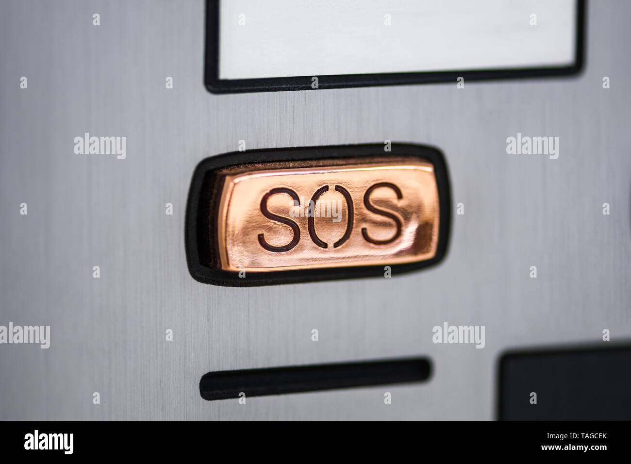 button SOS. SOS button close-up on the device panel, intercom. Help ...