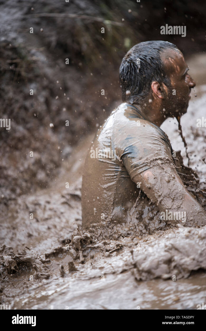 Man in mud hi-res stock photography and images - Alamy