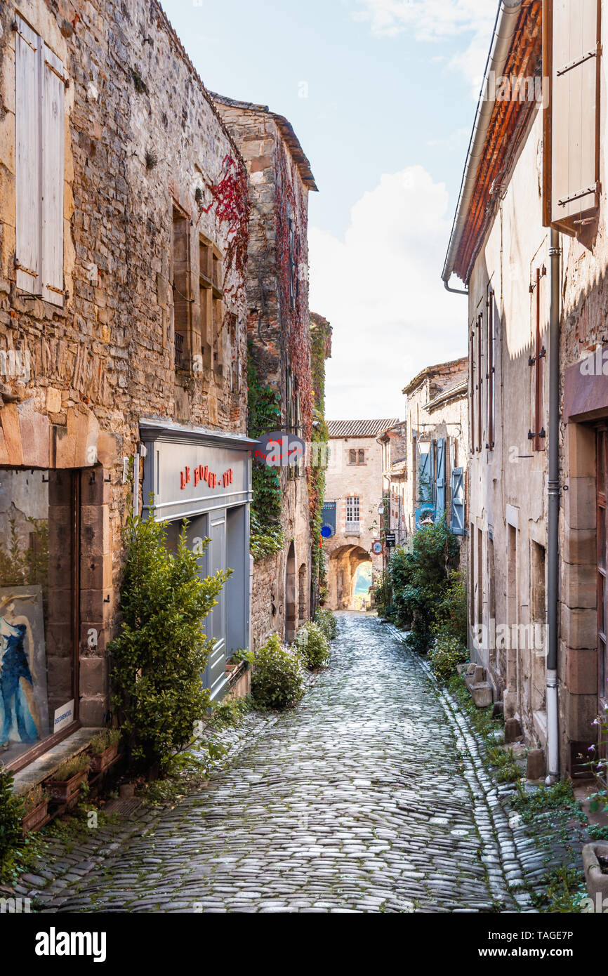 Cordes-sur-Ciel, Tarn, France - 3 October 2017: Cobblestone street of ...