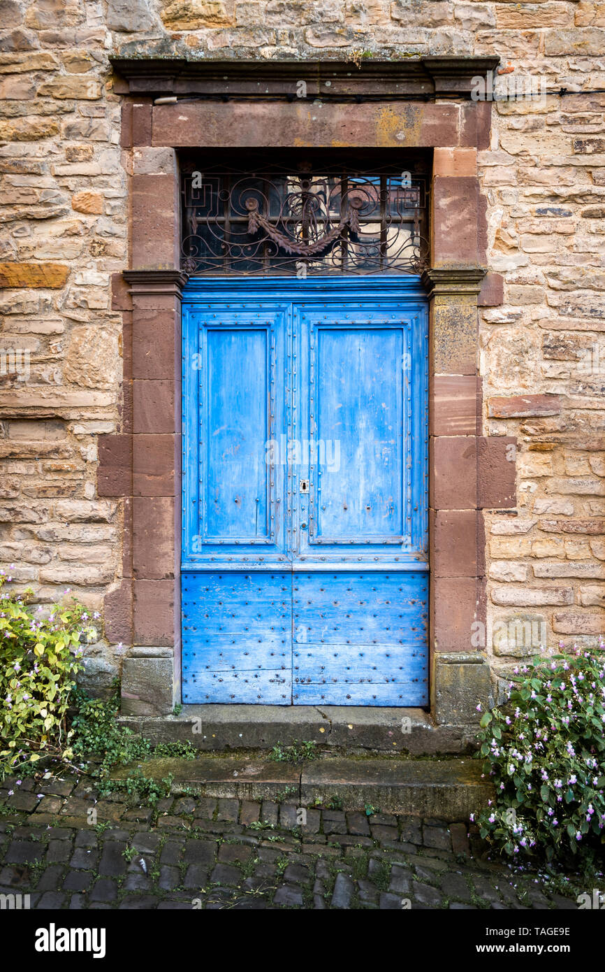 Rustic blue door entrance to an old stone house Stock Photo - Alamy