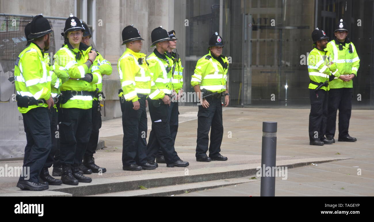 Greater Manchester Police officers in Manchester city centre, waiting ...