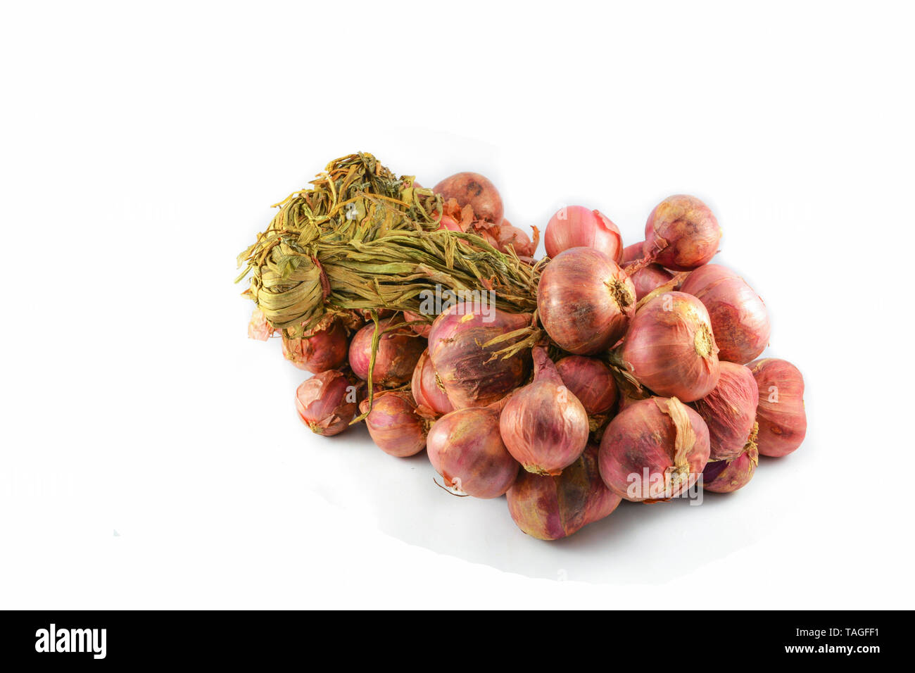 Pile of bunch Shallots isolated on white background - Allium ...