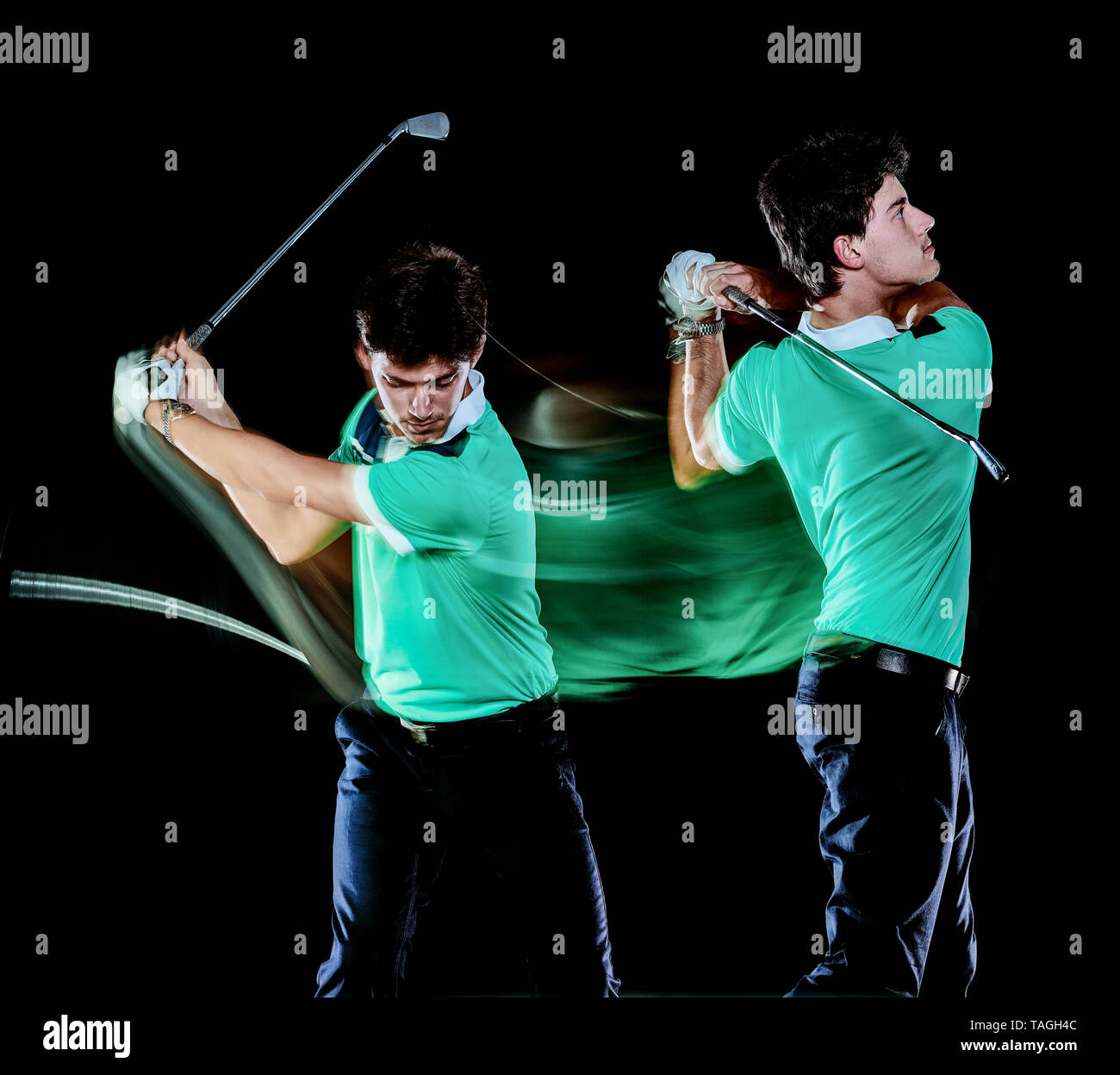 one caucasian young golfer man golfing golf swing isolated on black ...