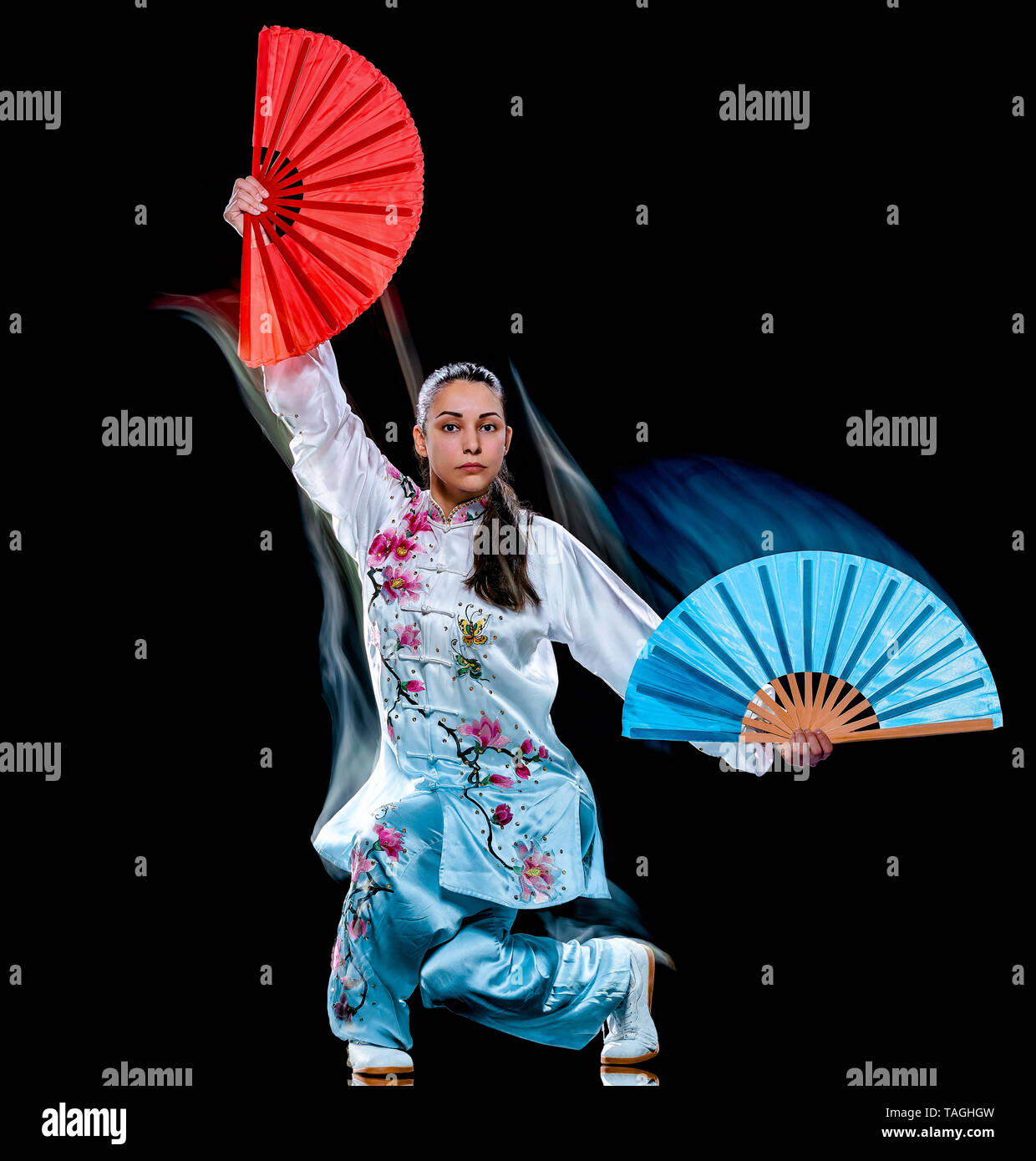 one chinese woman partacticing Tai Chi Chuan Tadjiquan posture studio ...