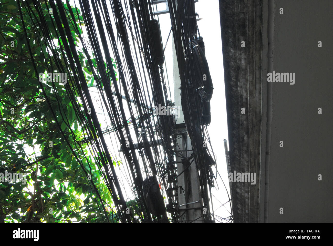 Power lines and cables that are cluttered on electric poles May cause a ...