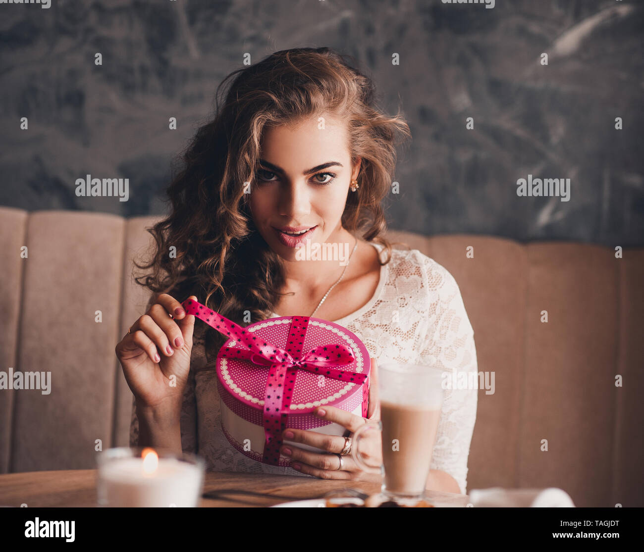 Woman open present hi-res stock photography and images - Alamy
