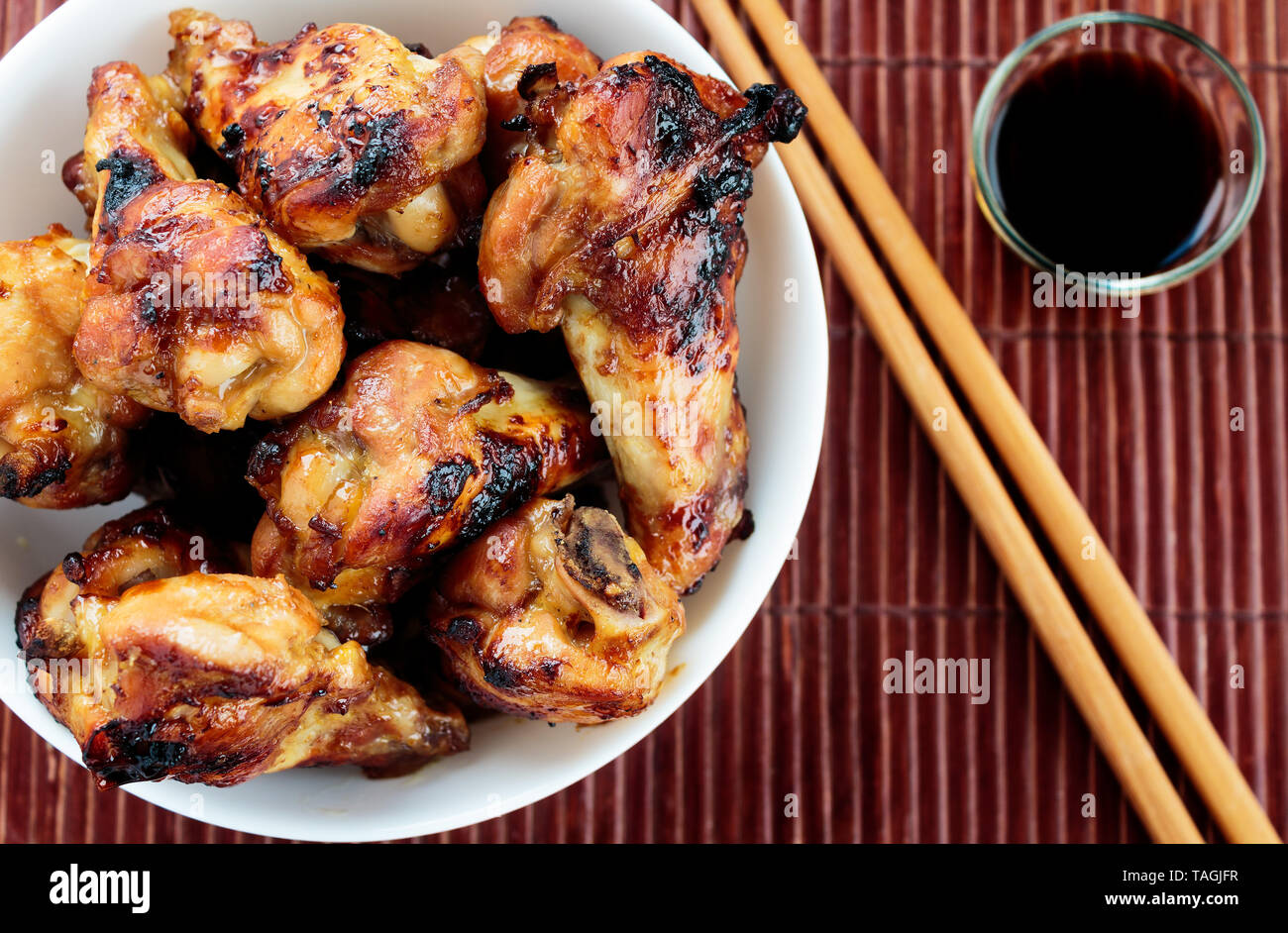 Glazed chicken wings drumstick Stock Photo - Alamy