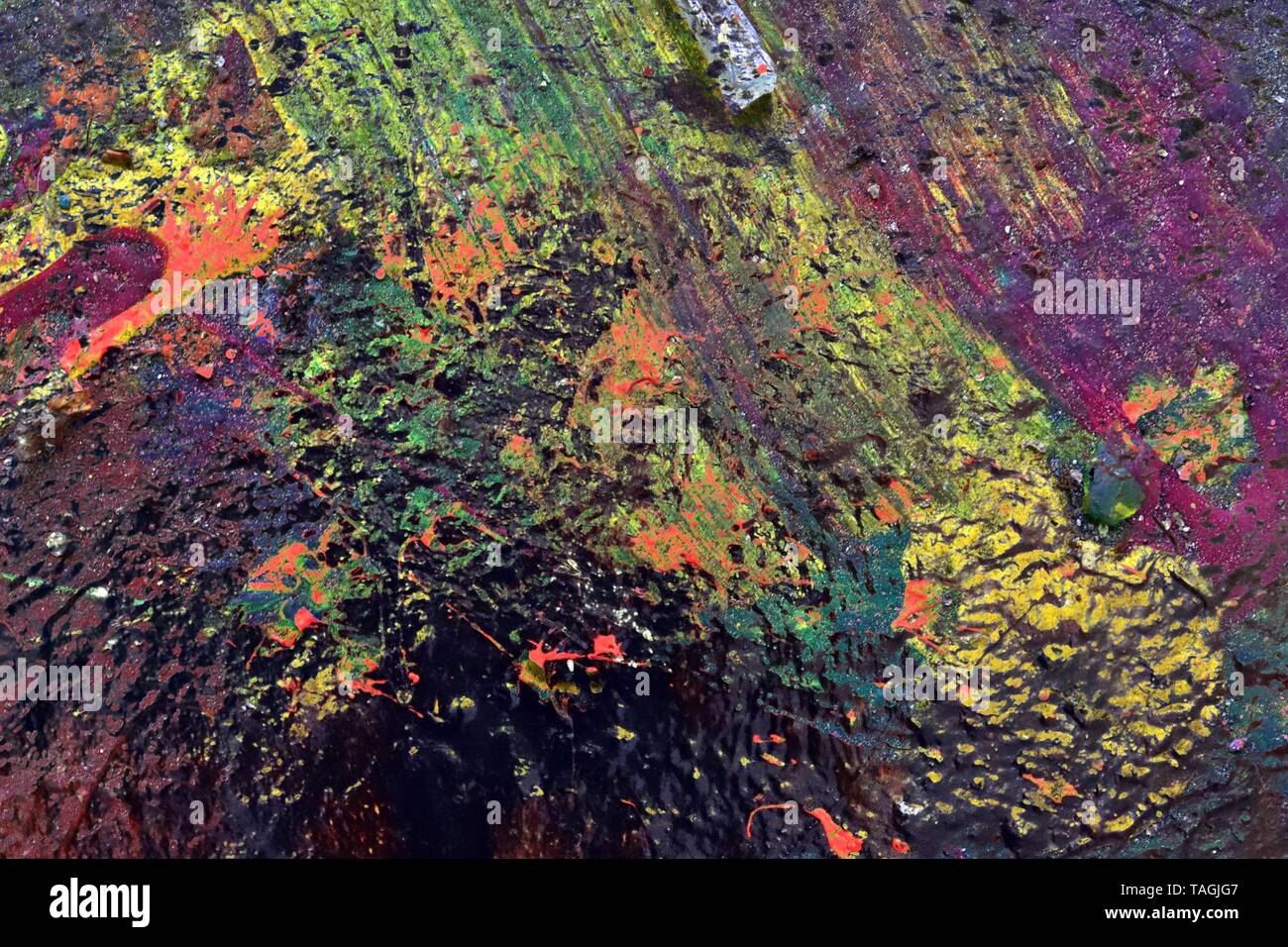 Colorful paint splashes at old and weathered concrete walls Stock Photo ...