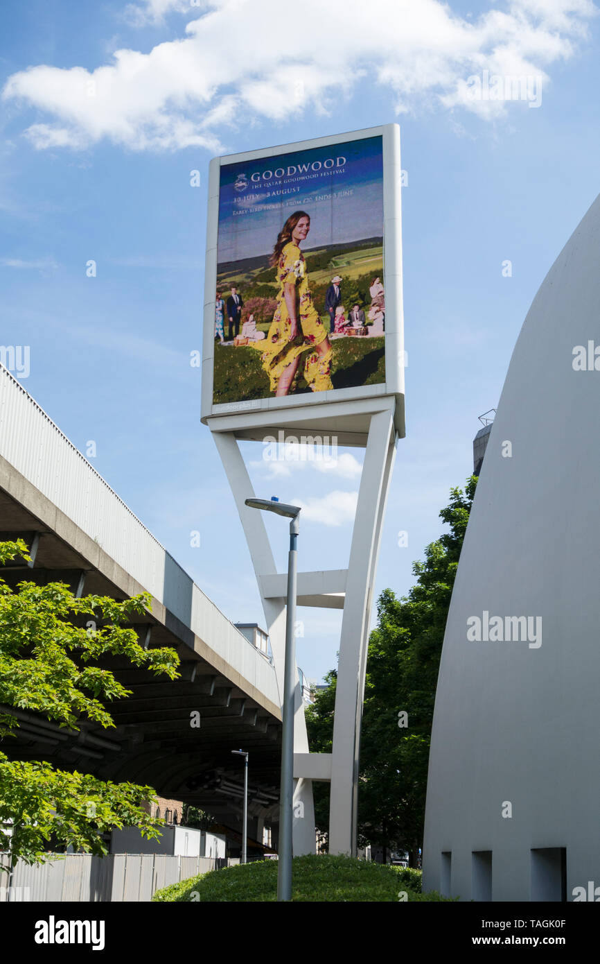 Goodwood advertisement on a digital billboard alongside Hammersmith ...