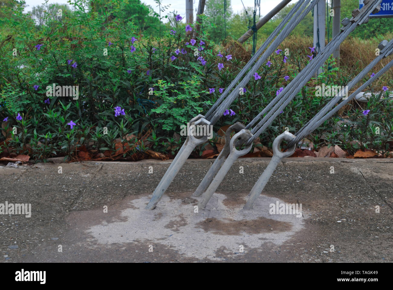 The sling pins are embedded in the cement for stability and strength ...