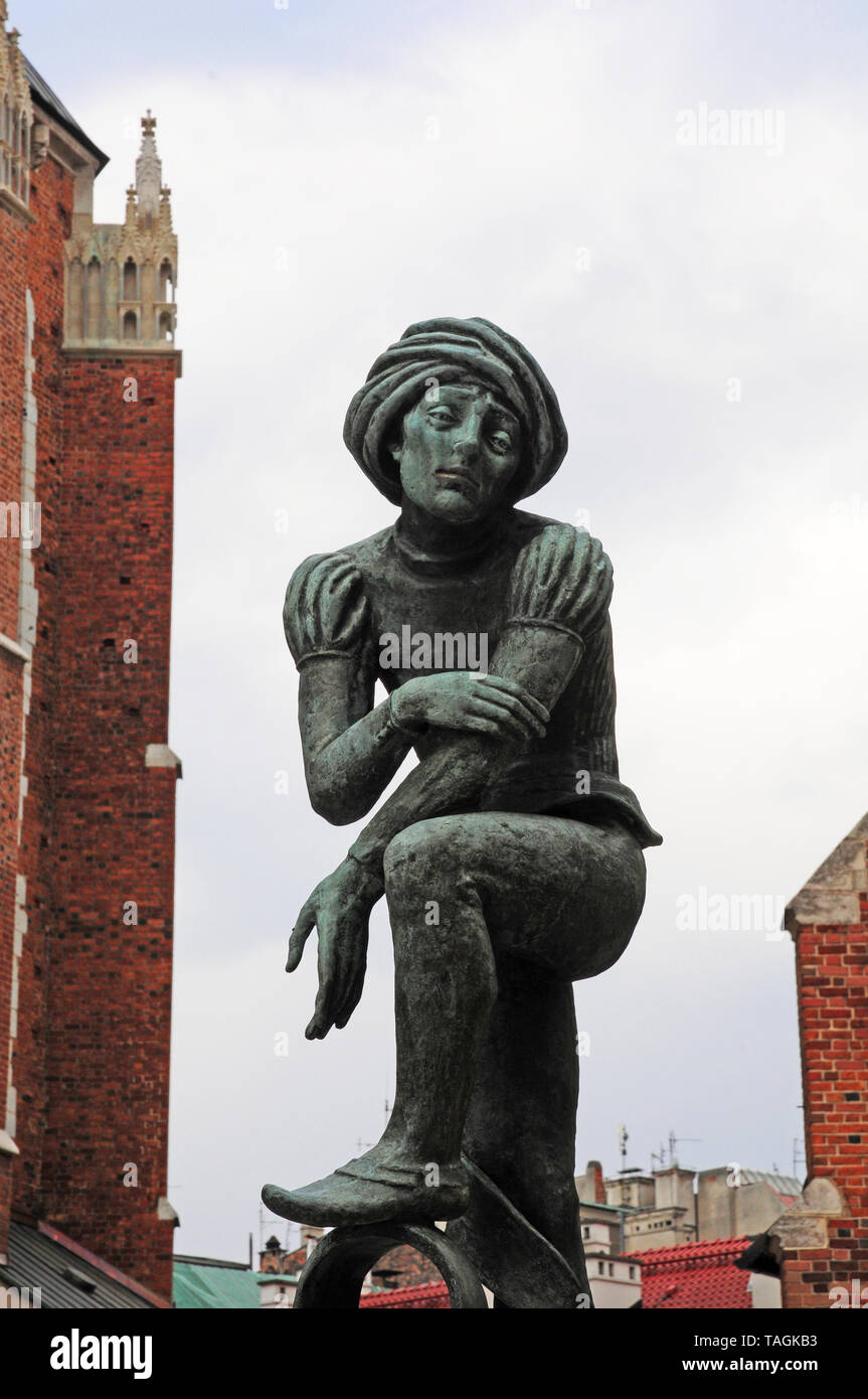 Statue of student at mariacki square hi-res stock photography and ...