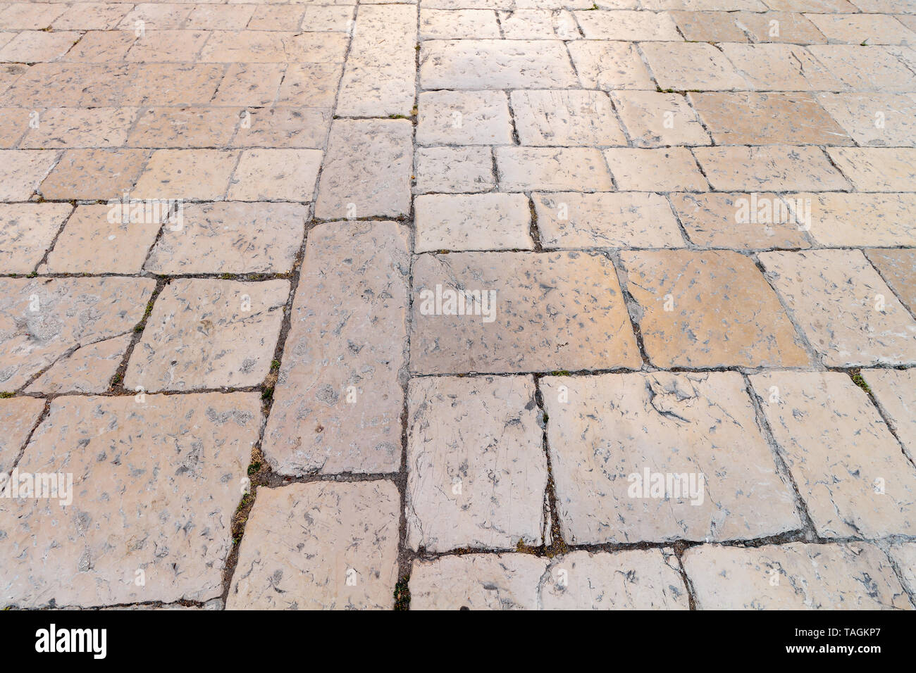 Stone blocks paved road, background Stock Photo - Alamy