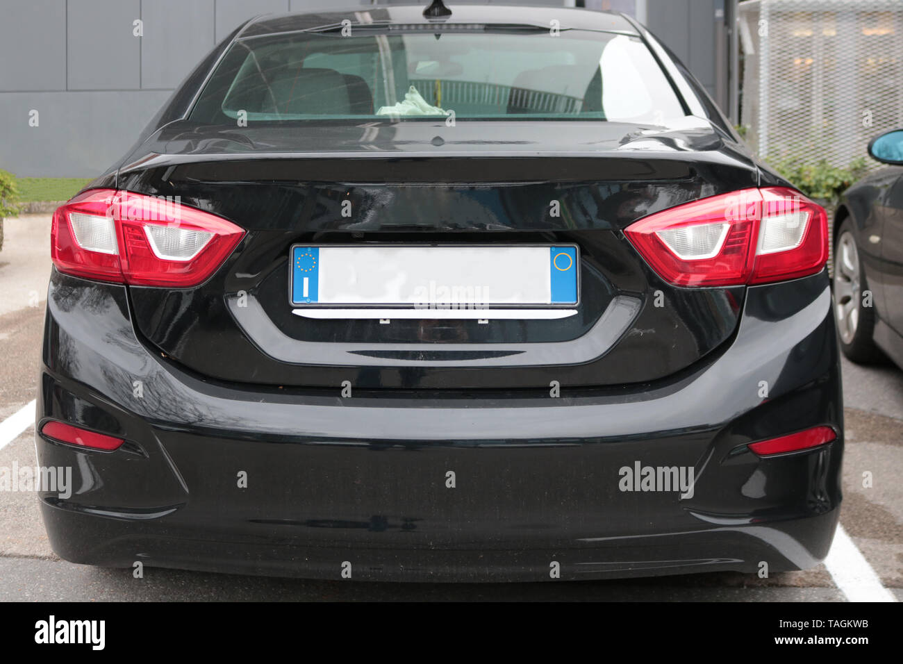 Empty License plate on the back of a black car Stock Photo - Alamy