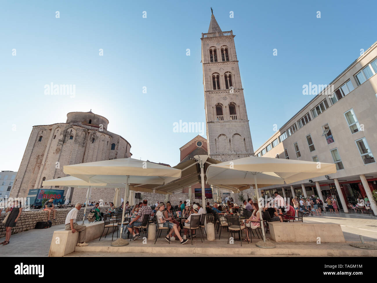 ZADAR, CROATIA - JULY 10, 2016: Tourists resting and drinking beverages ...