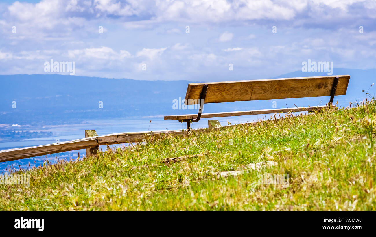 Wooden bench and vista point overlooking south San Francisco bay area ...
