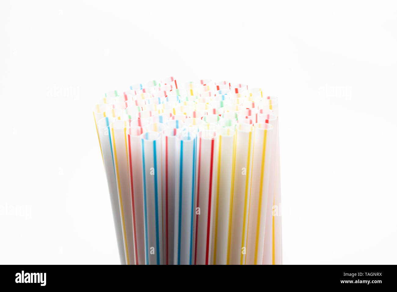 A close-up shot with selective focus of a bunch of unused colored bendy ...