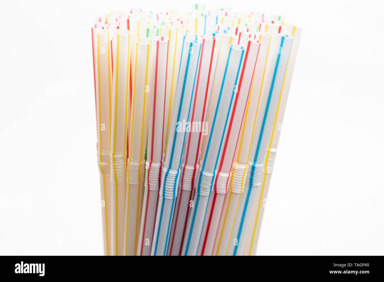 A close-up shot with selective focus of a bunch of unused colored bendy ...