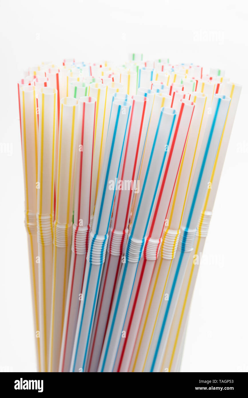 A close-up shot with selective focus of a bunch of unused colored bendy ...