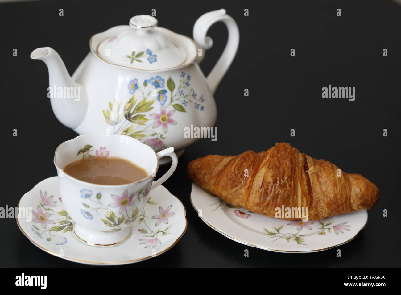 China breakfast set on a black background Stock Photo - Alamy