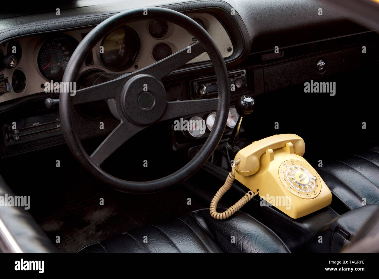 An old rotary telephone inside an antique car Stock Photo - Alamy