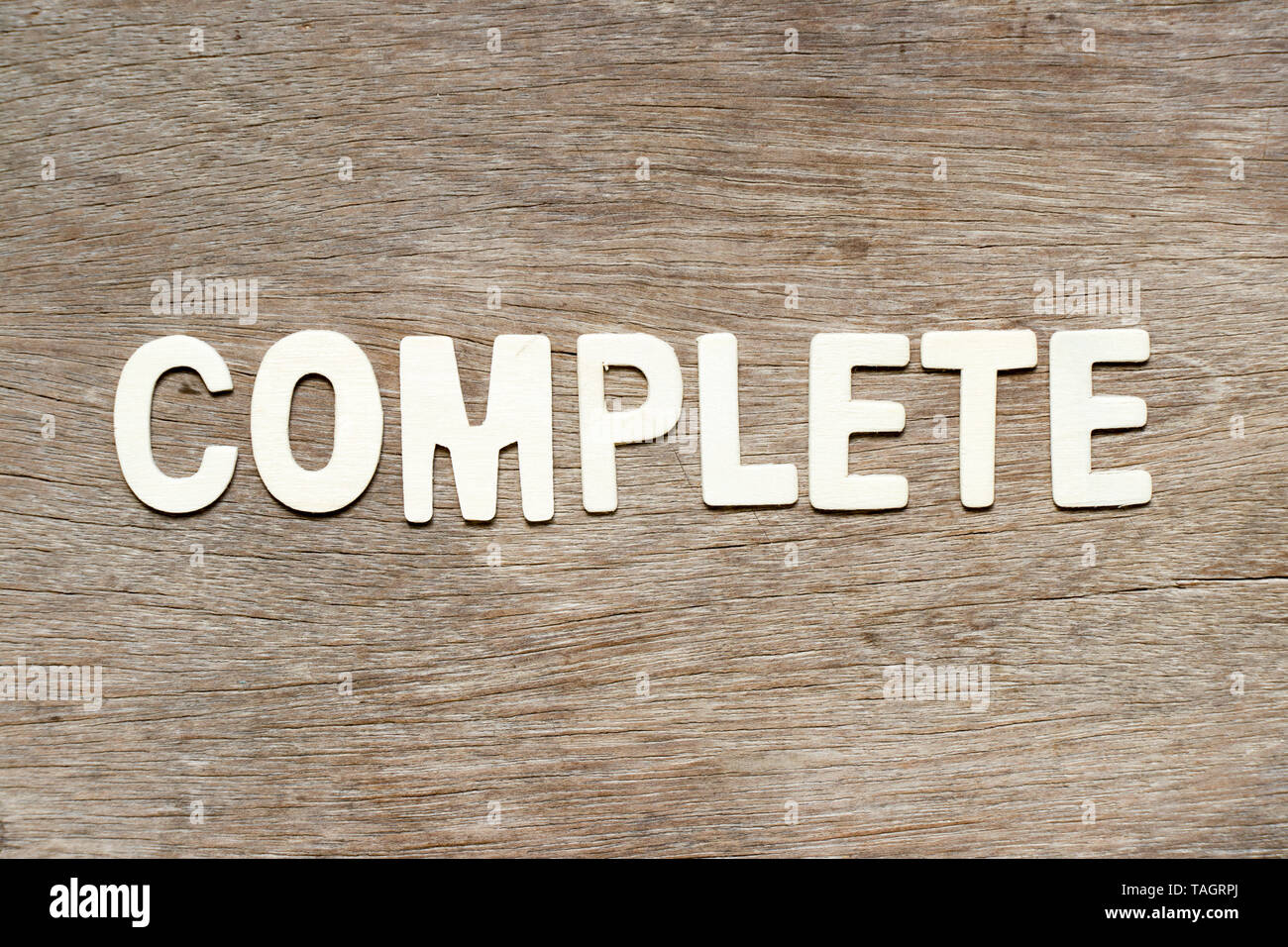 Alphabet letter in word complete on wood background Stock Photo - Alamy