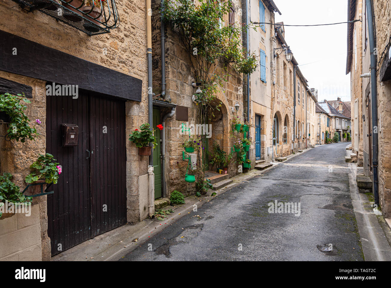 Rustic village street of Montignac Stock Photo - Alamy