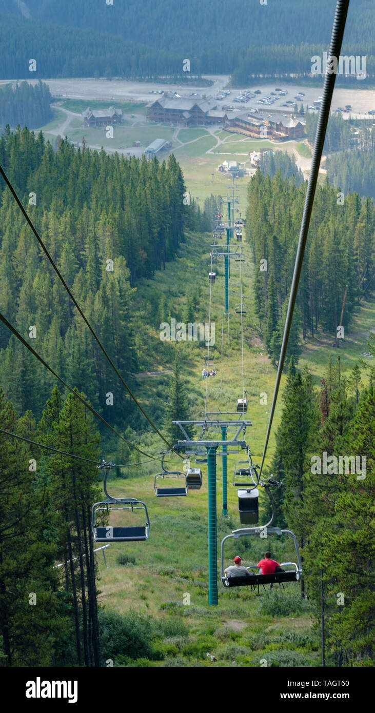 lake Louise ski lift ans lodge and people Stock Photo - Alamy