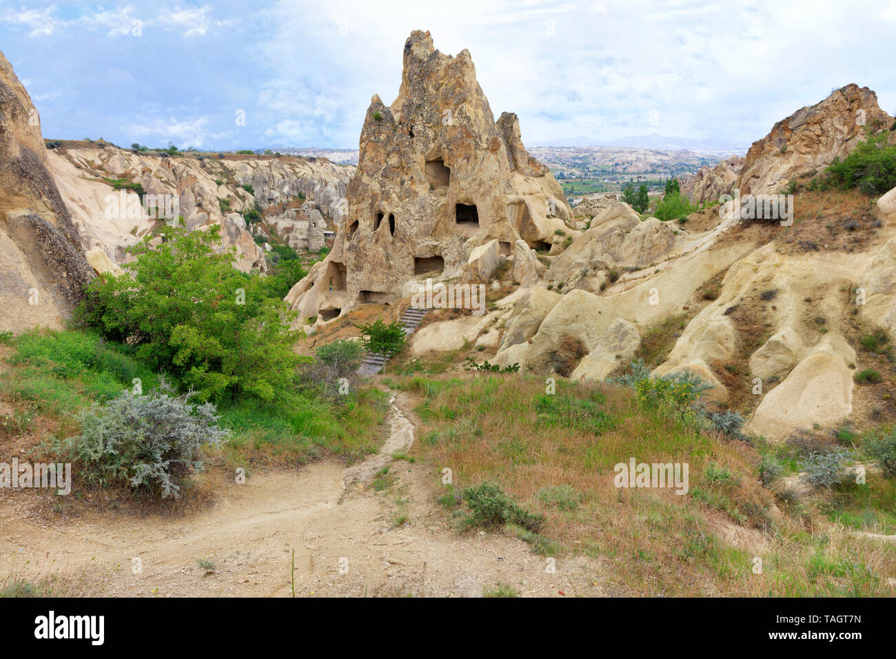 Antique landscape and view of ancient cone-shaped residential caves in ...