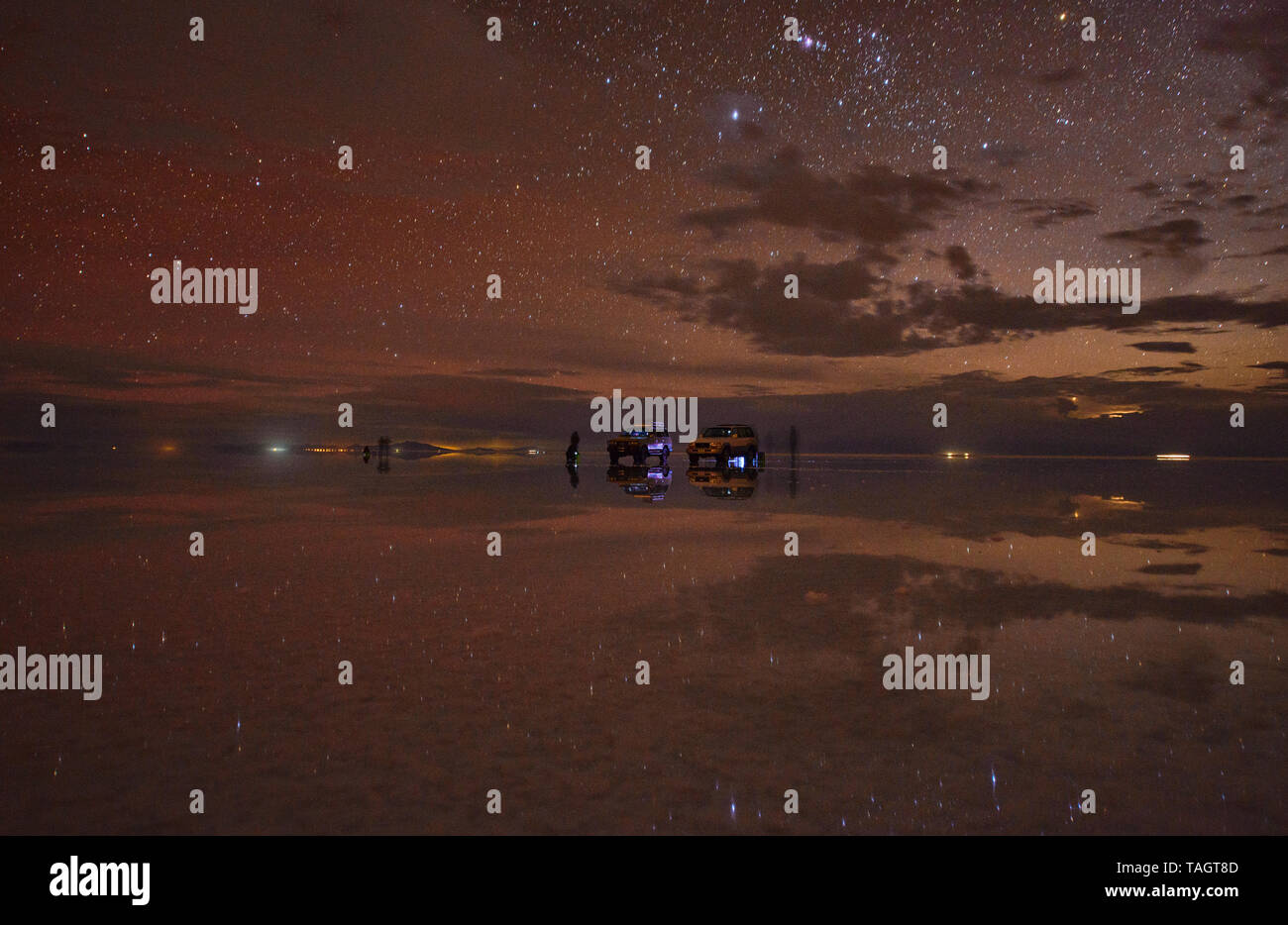 The stars and Milky Way reflections on the Salar de Uyuni, Bolivia ...